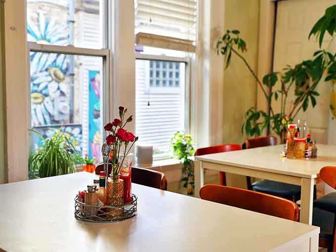 Sunshine walls and happy plants create the kind of cozy breakfast nook where calories definitely don't count.