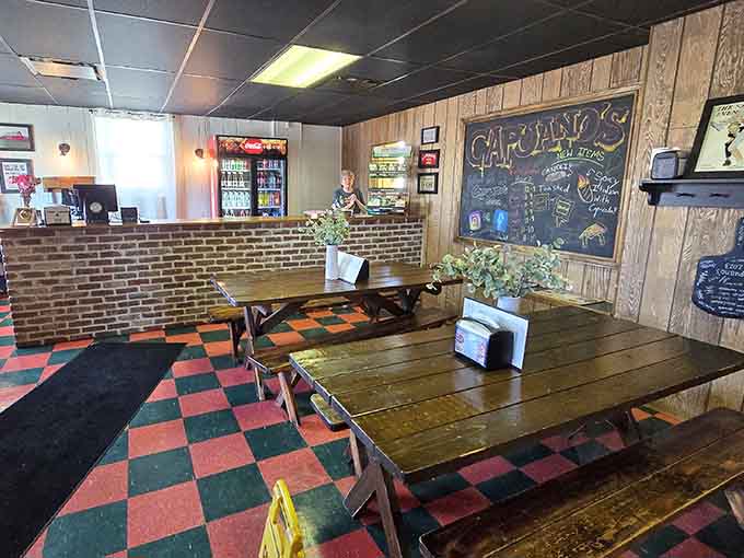Step inside and travel back to 1985, where checkered floors and wood paneling create the perfect backdrop for serious eating.