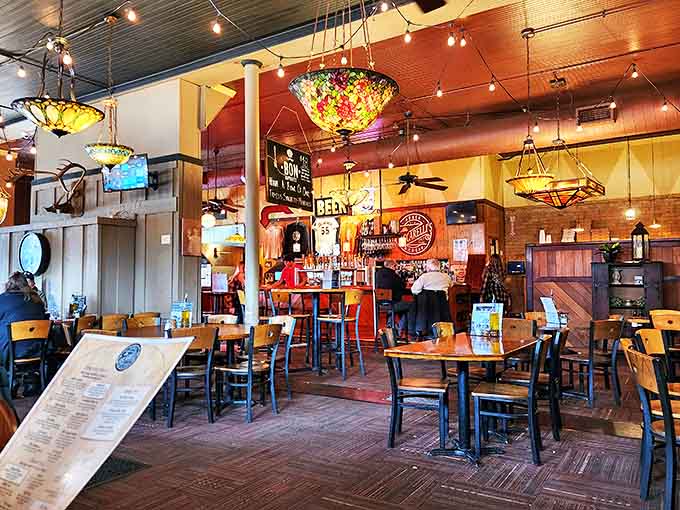 Warm wooden tones, colorful stained glass lights, and that unmistakable pizza parlor buzz create the perfect backdrop for memory-making meals.