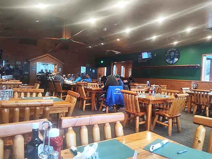 Inside, the warm wood-paneled dining room creates the perfect northwoods atmosphere, where sturdy log furniture invites guests to settle in and stay awhile.