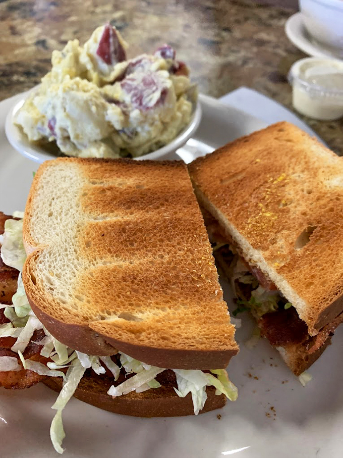 The Eiffel Tower of sandwiches! This club is so tall, you'll need to unhinge your jaw like a snake.