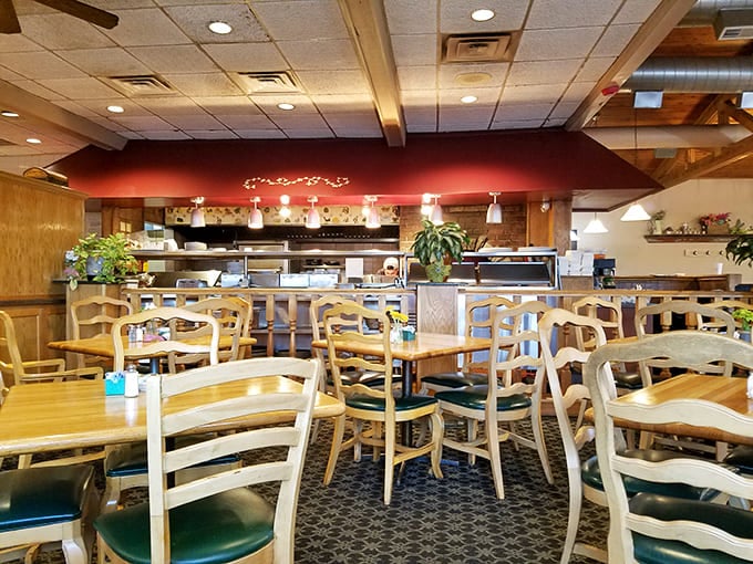 Wooden beams and warm lighting create the kind of cozy atmosphere where time slows down and second cups of coffee are mandatory.