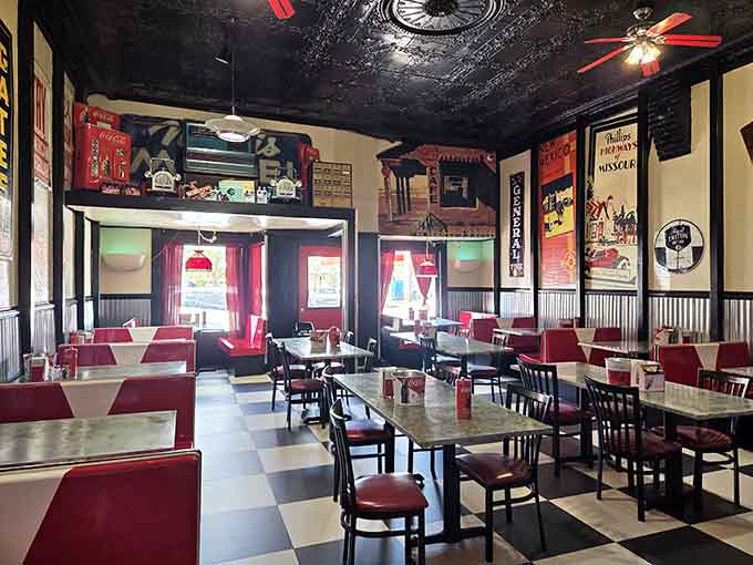 Step inside and you're transported to the golden age of American diners, complete with red vinyl booths and checkered floors.