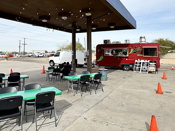 Dining Area: Simple tables under an open sky transform this former gas station into an al fresco dining paradise where strangers become friends over shared meals.