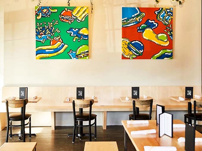 Exposed beams and vibrant art create the perfect backdrop for Burlington's food lovers. Conversation flows as freely as the coffee.