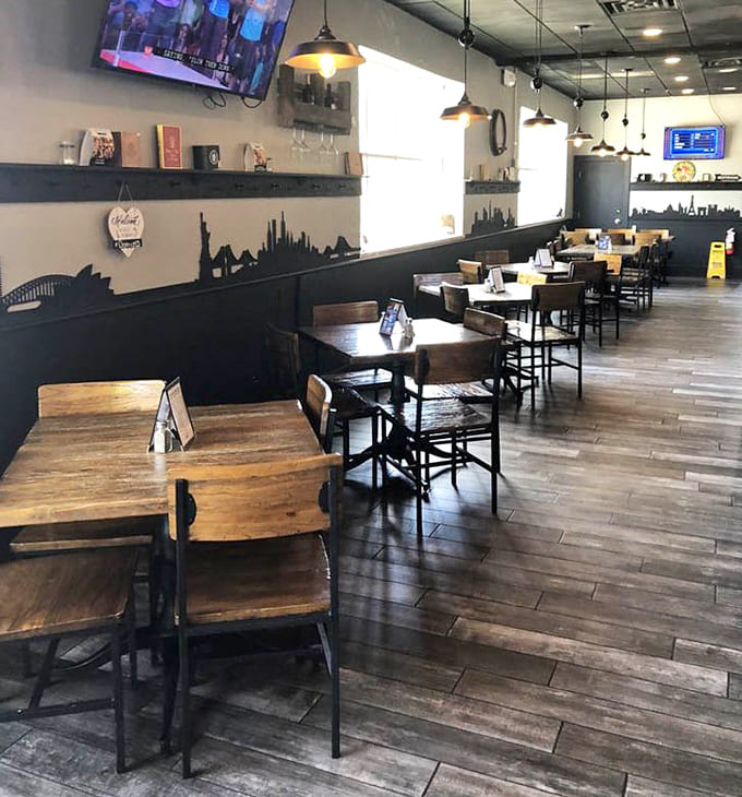 Clean lines and city skyline silhouettes create a modern gastropub vibe that's comfortable without trying too hard to impress.