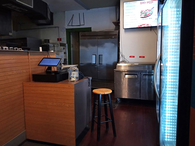 Inside, the streamlined setup keeps things simple so the kitchen can focus on what really matters: your pizza.