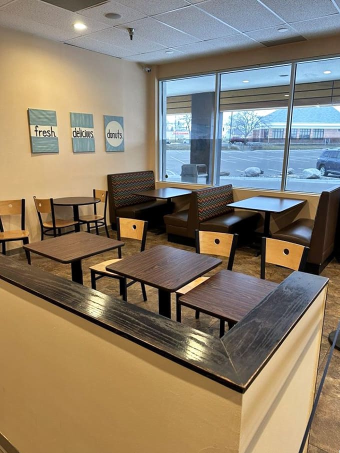 Clean, comfortable seating and warm lighting create the perfect casual atmosphere for enjoying a legendary sandwich.