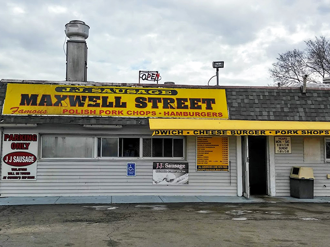 A humble facade hiding gastronomic treasures. This unassuming building houses more flavor per square foot than your average food court.