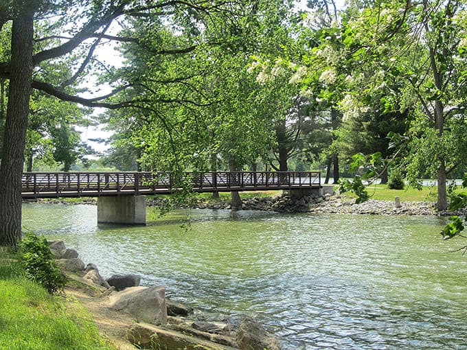This footbridge over the water proves that sometimes the journey really is as beautiful as the destination, especially with reflections like that.