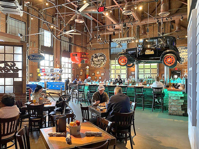 Soaring ceilings, suspended vintage Fords, and turquoise accents create an automotive wonderland where the decor is almost as impressive as what's coming out of the kitchen.