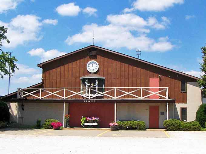A rustic barn-front façade greets visitors with timeless charm, where vintage simplicity meets Midwestern warmth in this unassuming local treasure.