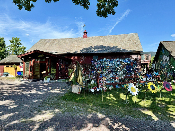 Sunlight dances across The Sparkle Barn's exterior, where colorful art installations transform a traditional Vermont barn into a playground for the imagination.