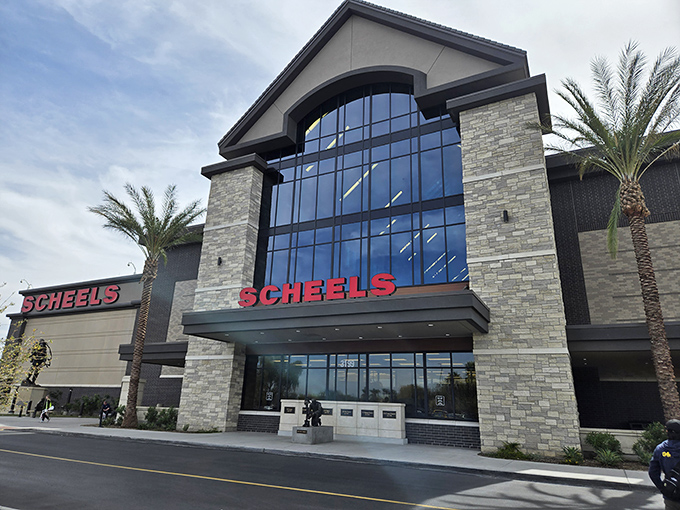 Palm trees frame the grand entrance of Scheels, where Arizona sunshine meets retail innovation in spectacular fashion.