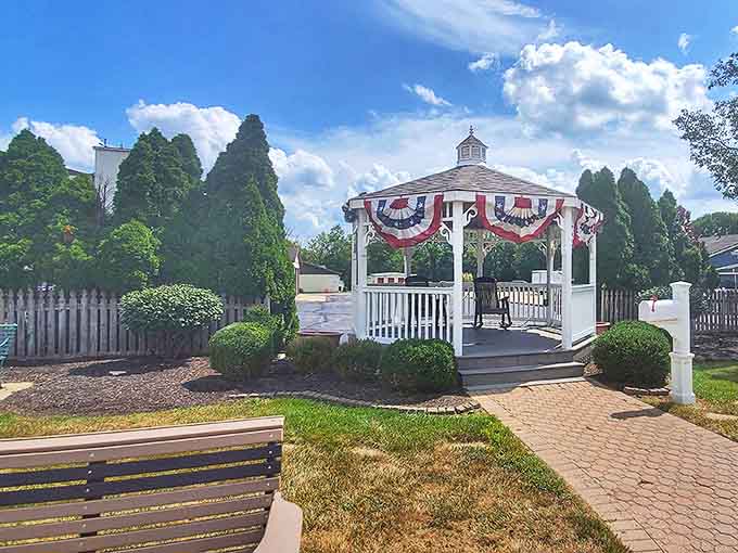 The town gazebo stands like a wedding cake centerpiece in the heart of Waynesville, festooned with patriotic bunting that flutters in the Ohio breeze.
