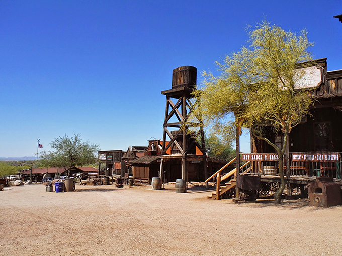 Goldfield Ghost Town offers a delightful step back in time, where weathered wooden buildings and an old water tower stand as monuments to Arizona's mining heyday.
