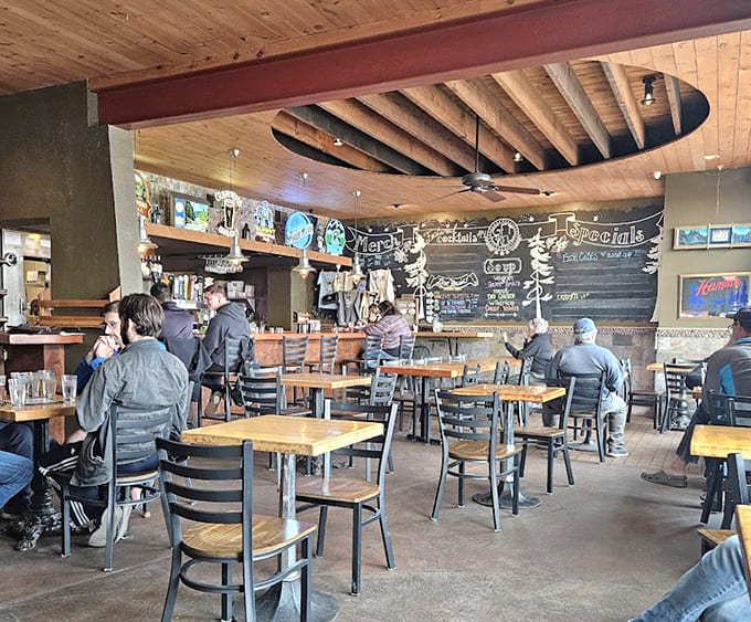 Exposed beams and wooden tables create that perfect tavern vibe where everyone feels like a regular, even on their first visit.