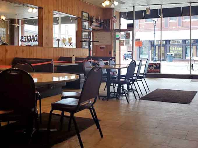 Wood paneling and mismatched chairs create the kind of authentic diner atmosphere you can't buy from a decorator.