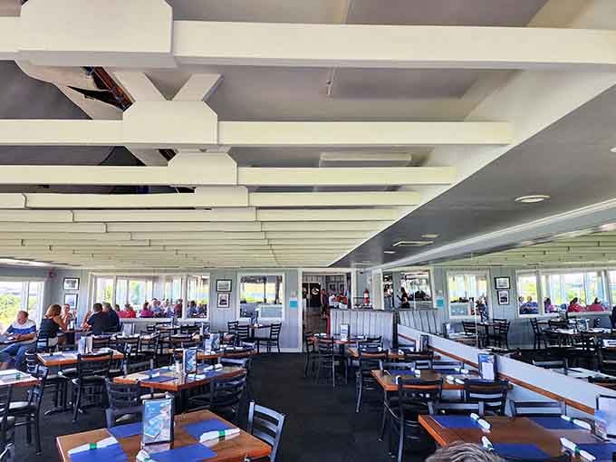 Inside, the spacious dining room balances casual comfort with waterfront elegance, proving you don't need white tablecloths to create something special.