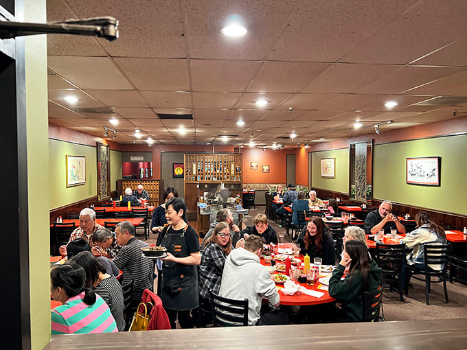 Inside, warm lighting and traditional touches create a welcoming space where the focus stays squarely on the food, not fancy fixtures.