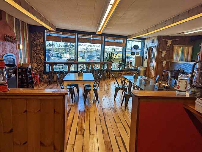 Warm wood floors and colorful accents create a space where comfort food meets comfortable vibes in the best possible way.