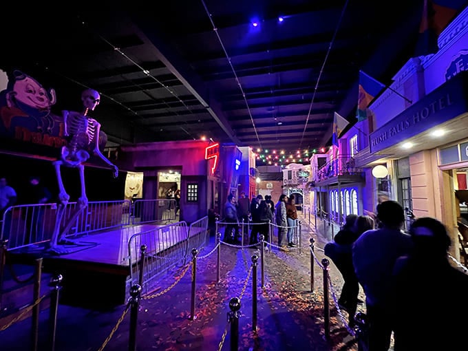 Visitors navigate the haunted street scene, where every shadow might hide a lurking terror and anticipation builds with each step toward the unknown.