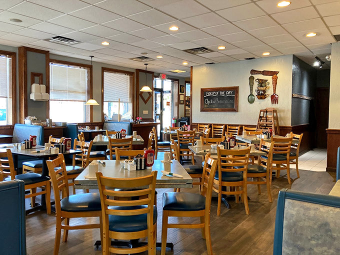 Step into a time capsule of comfort! Wooden chairs, cozy booths, and a chalkboard menu create an atmosphere that's as warm as the coffee.