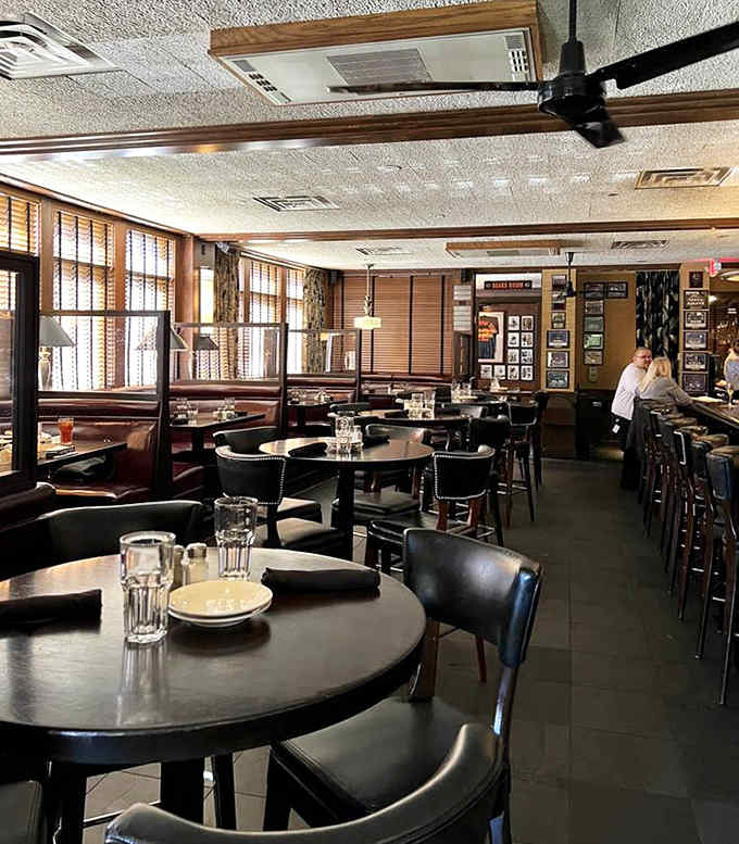 Dark wood, leather seating, and ambient lighting create the perfect backdrop for conversation and cuisine that demands your full attention.