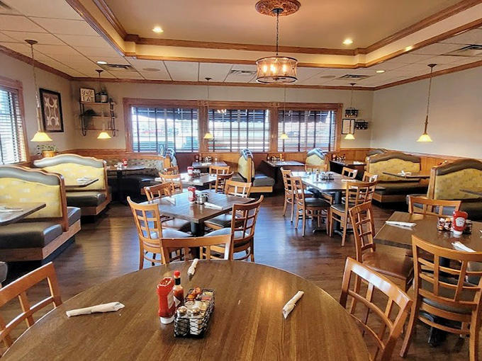 Wood tones and cozy booths create the perfect breakfast sanctuary where time slows down and appetites wake up with enthusiasm.