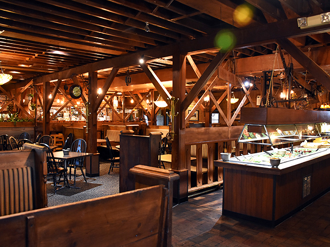 Exposed wooden beams create a cathedral of comfort food, where rustic charm isn't manufactured but earned through decades of authentic hospitality.