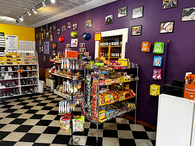 Interior: Checkered floors and colorful displays create a candy wonderland where adults become kids and kids become absolutely unstoppable.