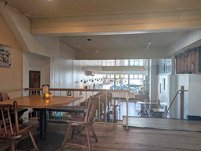 Warm wooden interiors create an inviting atmosphere where conversations flow as freely as the wine, making every meal feel like a special occasion.