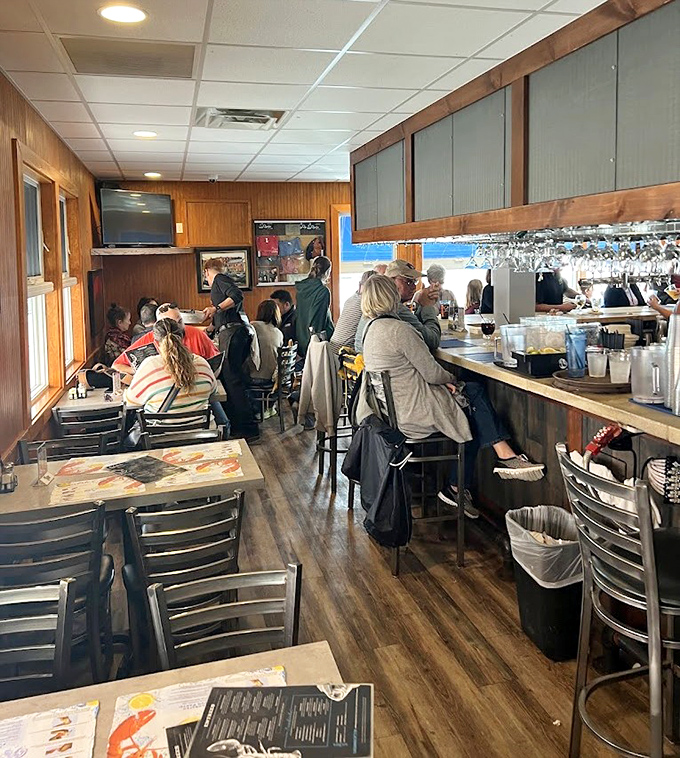 Inside J's Oyster, wood-paneled warmth welcomes seafood lovers to a no-nonsense dining experience where the food, not fancy d&eacute;cor, takes center stage.