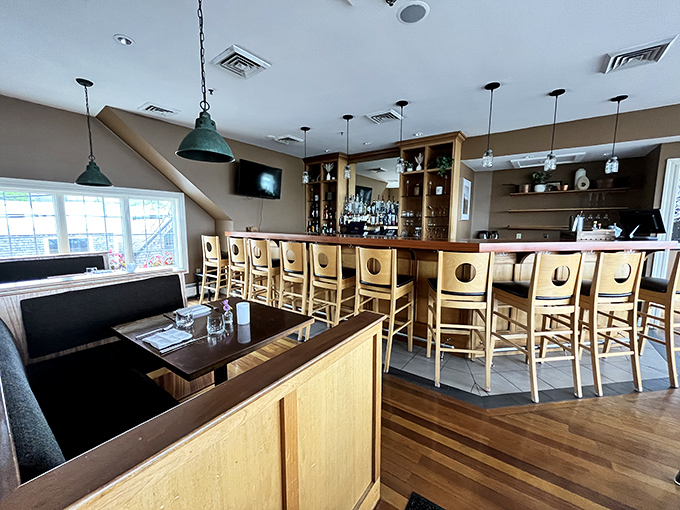 Warm wooden accents and nautical touches create the perfect backdrop for seafood feasting, with every seat offering a slice of coastal charm.