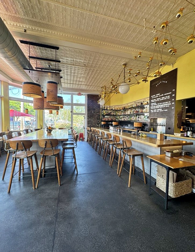 Sunshine streams through windows onto wooden tables while honeycomb pendant lights cast a golden glow &ndash; the perfect setting for noodle-slurping nirvana.