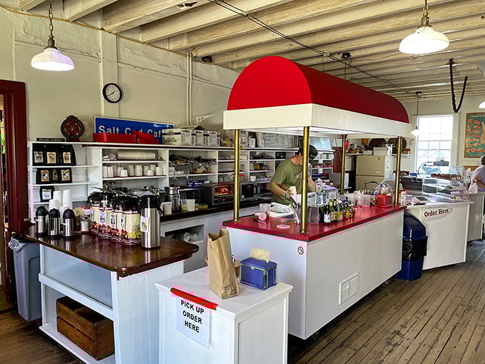 Inside, simplicity reigns supreme &ndash; white walls, wooden counters, and a red-topped service station where breakfast dreams come true.