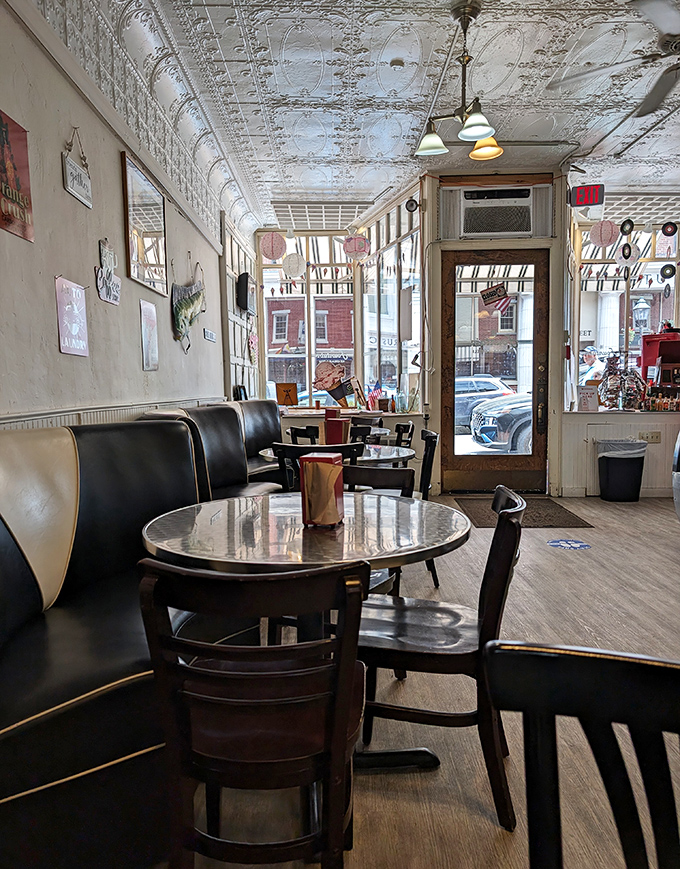 Step inside to a time capsule of nostalgic charm &ndash; pressed tin ceilings, pendant lighting, and cozy booths create an atmosphere that money can't manufacture.