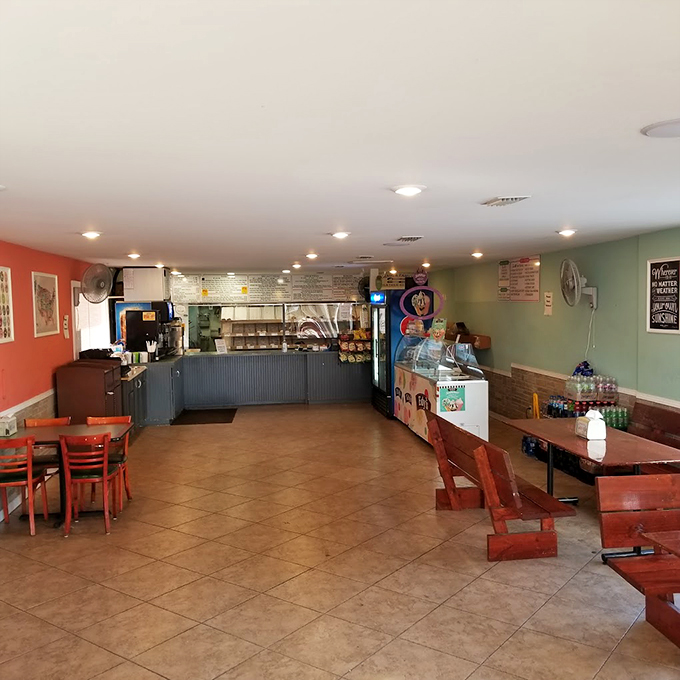 Step into a kaleidoscope of flavors! This cheerful interior promises a feast for both the eyes and the taste buds.