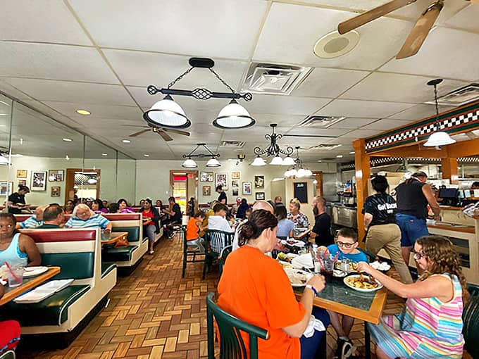 The bustling interior hums with conversation and laughter as diners tackle portions that redefine the concept of "generous."