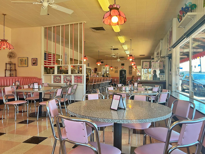 Step inside and travel back in time &ndash; pink booths, chrome accents, and vintage lighting create the perfect backdrop for ice cream memories.