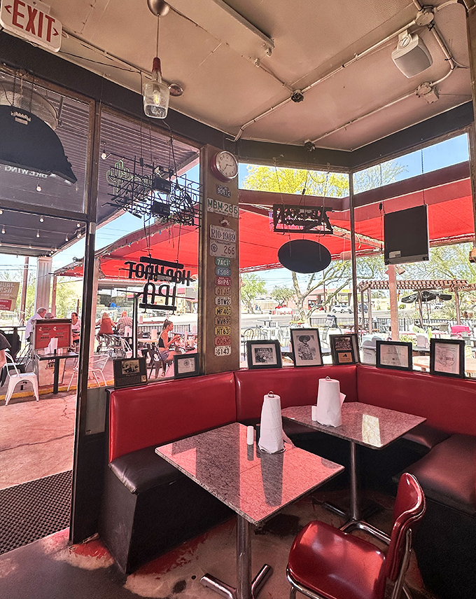 Red vinyl booths and vintage decor transport diners back to simpler times, while the sunlight streams through windows framing desert views.