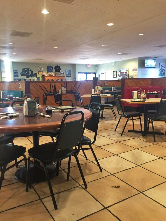 Interior: Red vinyl booths and wood paneling create that perfect time-capsule feeling &ndash; like comfort food for your eyes before the real feast begins.