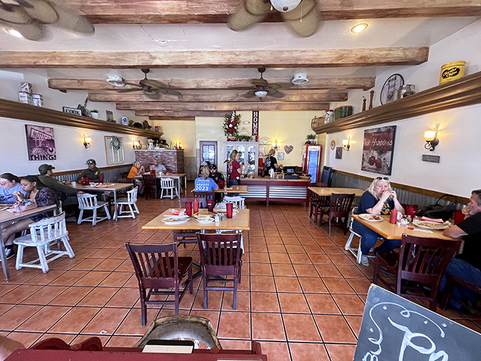 Rustic wooden beams and warm lighting create the perfect backdrop for morning conversations and coffee refills that never seem to end.