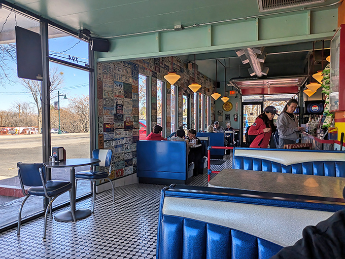 Blue vinyl booths and checkered floors – stepping into Bing's interior feels like walking onto the set of your favorite classic American film.