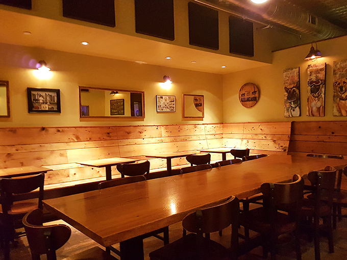 Warm wood paneling and intimate lighting create the perfect backdrop for memorable meals and conversations that flow as smoothly as the craft beers.