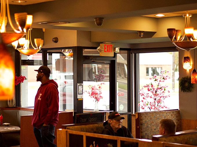 Step into a world where warm lighting and cozy booths set the stage for culinary magic. It's like your grandma's kitchen, but with better mood lighting! 