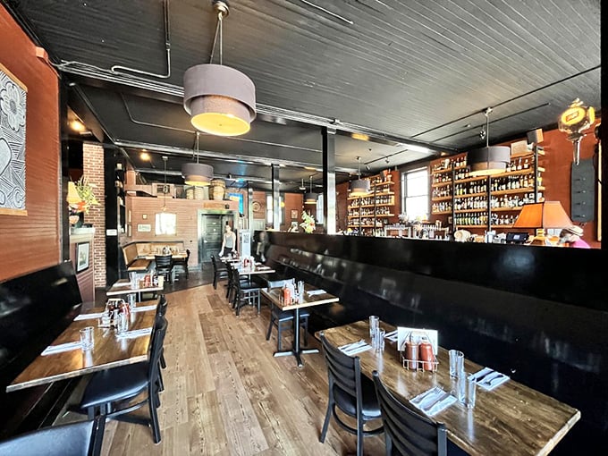 Inside, warm wood tones and a well-stocked bar create the perfect backdrop for culinary adventures and craft beer explorations.