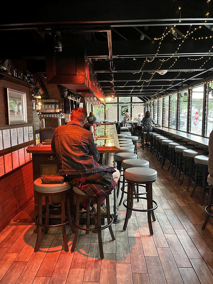 Warm wooden interiors and string lights create the perfect ambiance for savoring house-brewed beers at this cozy bar.