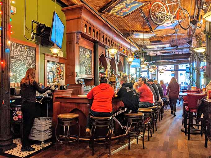 Warm wooden ceilings and exposed brick create a cozy atmosphere where beer lovers and foodies unite in perfect harmony.