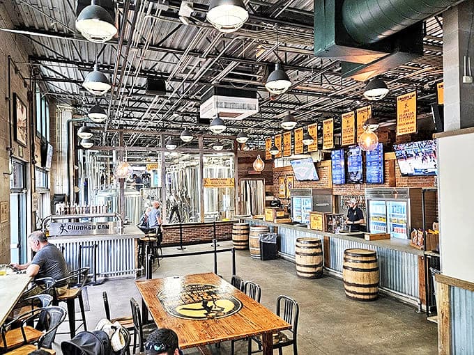 Industrial-chic meets craft beer heaven inside Crooked Can, where gleaming tanks and warm wood tones create an irresistible atmosphere.